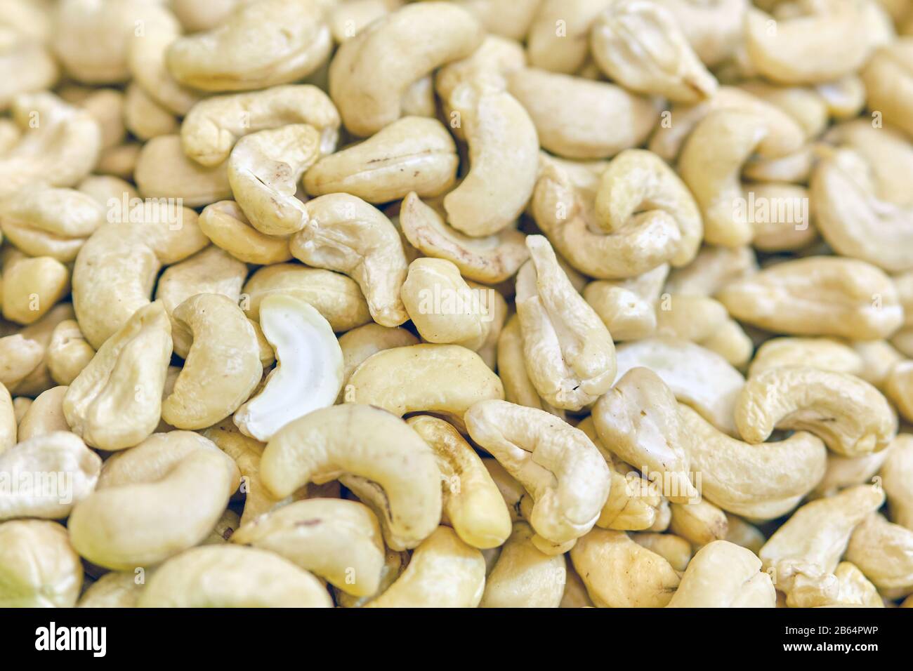 Background and texture of peeled cashew nuts. Close up Stock Photo - Alamy