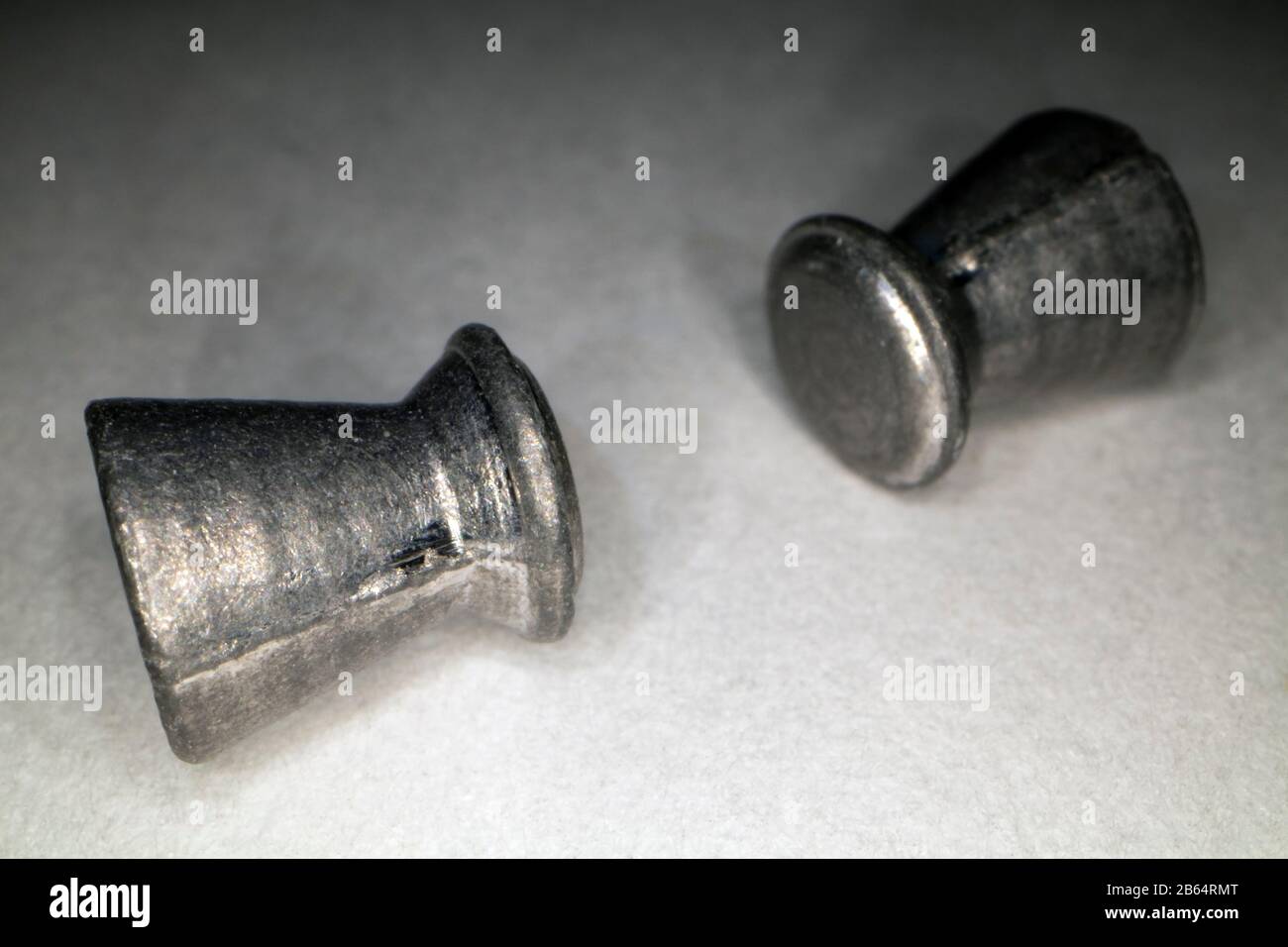 lead airgun pellets macro background Stock Photo - Alamy
