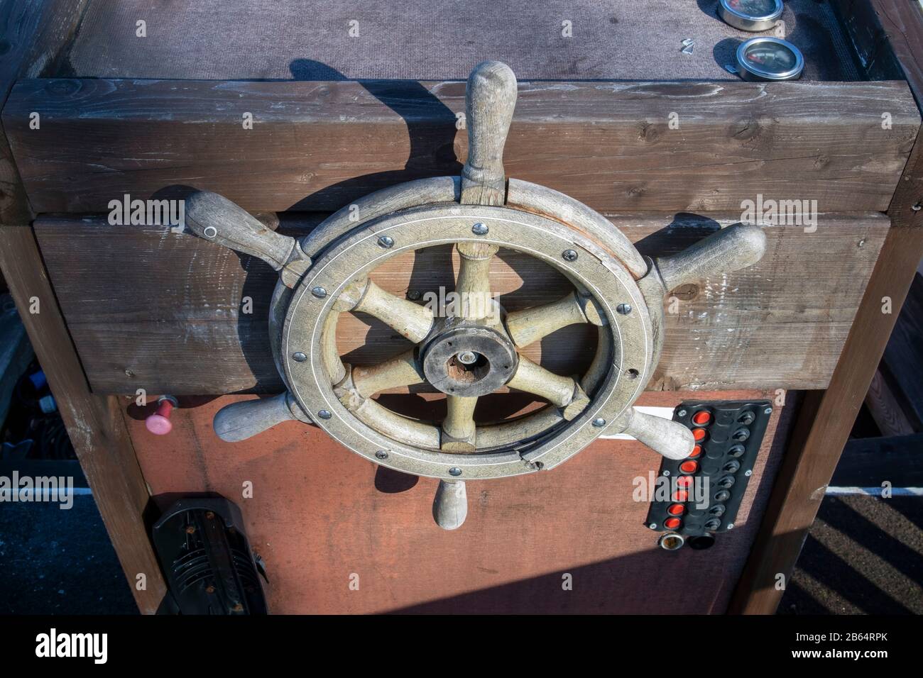 old wooden helm of a boat Stock Photo - Alamy