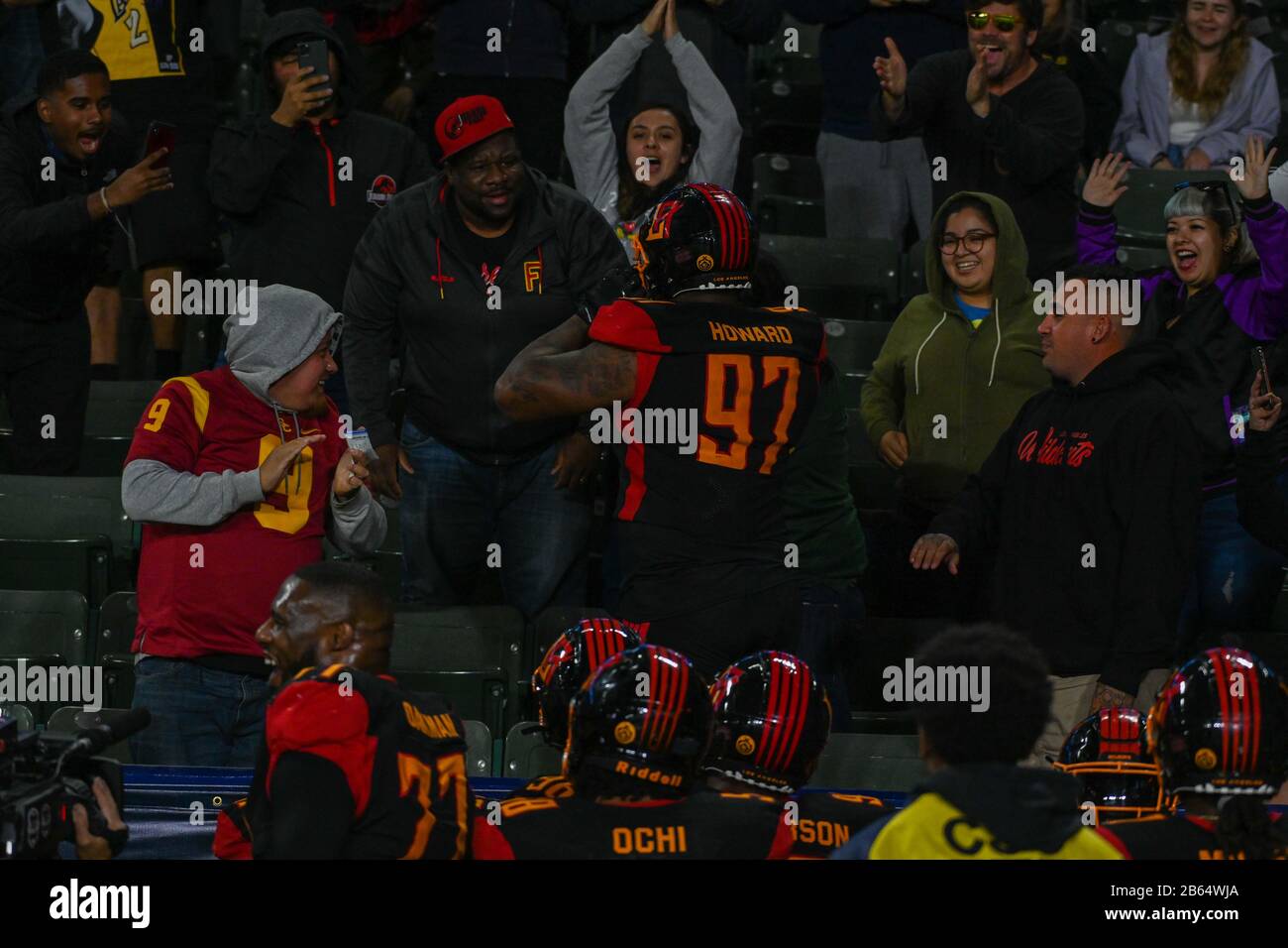 LA Wildcats defensive tackle Reggie Howard (97) celebrates with fans ...