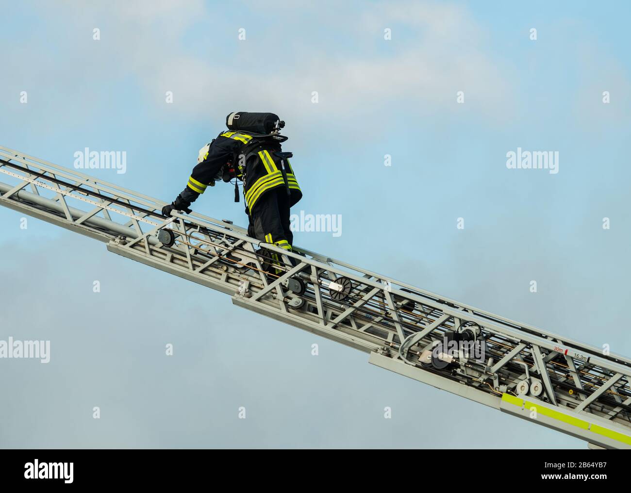 Fireman up ladder hi-res stock photography and images - Alamy