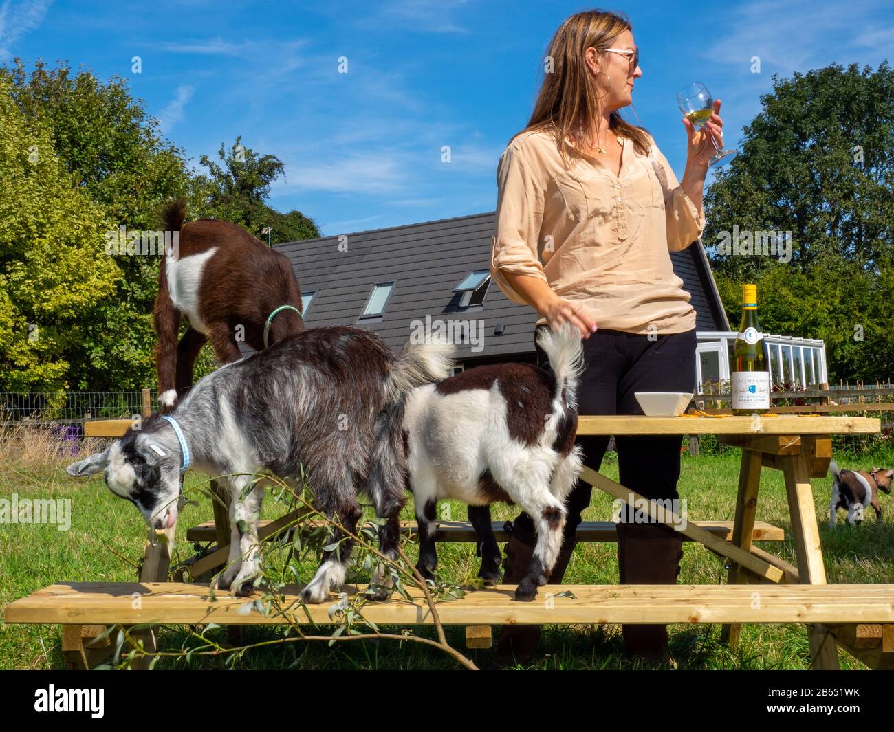 A woman at her home in the countryside where she lives with her family ...
