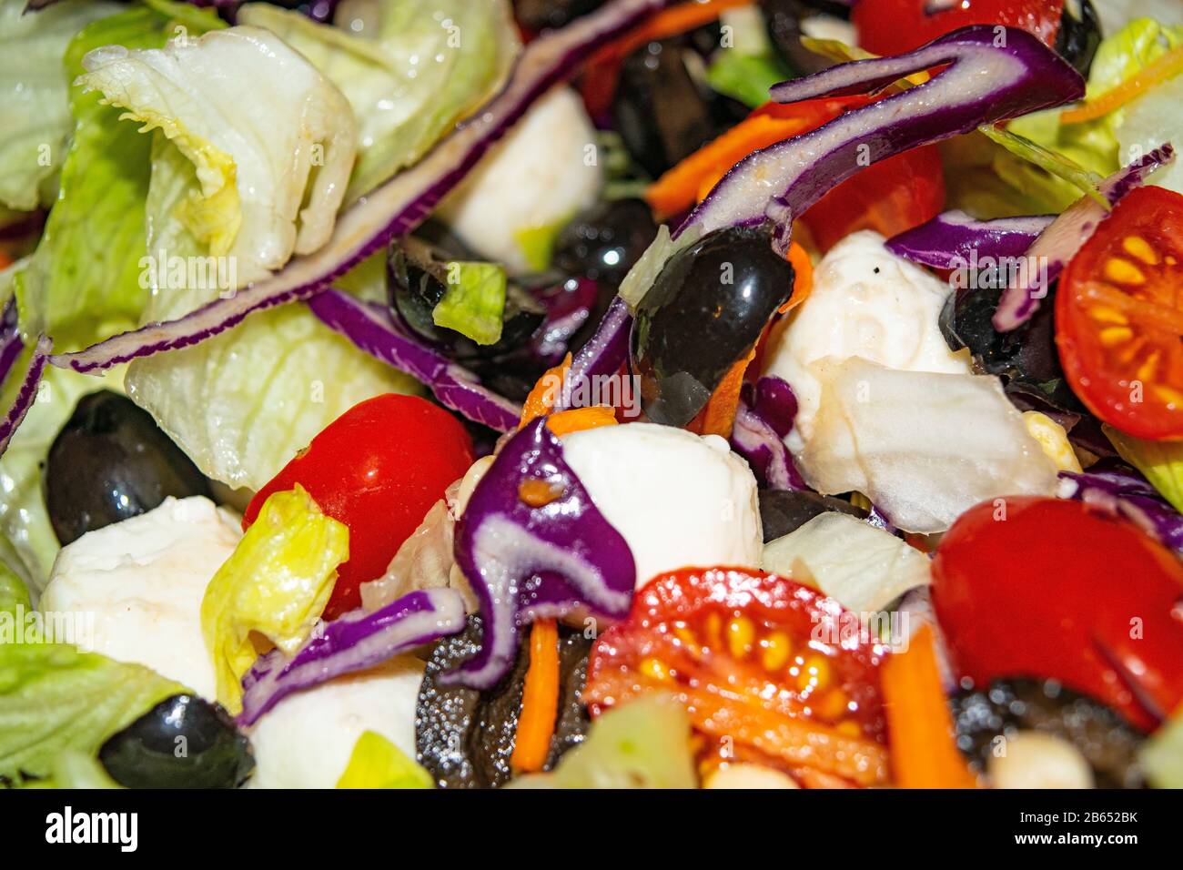 Vegetable salad with mozzarella. Surface texture. Close up Stock Photo ...