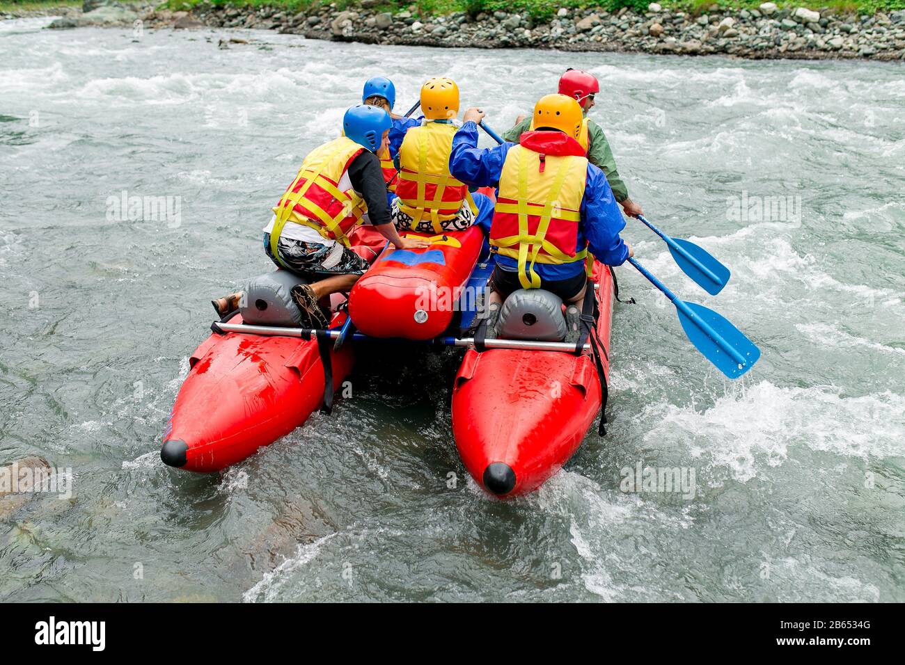 rafting on a catamaran on the mountain river Stock Photo - Alamy