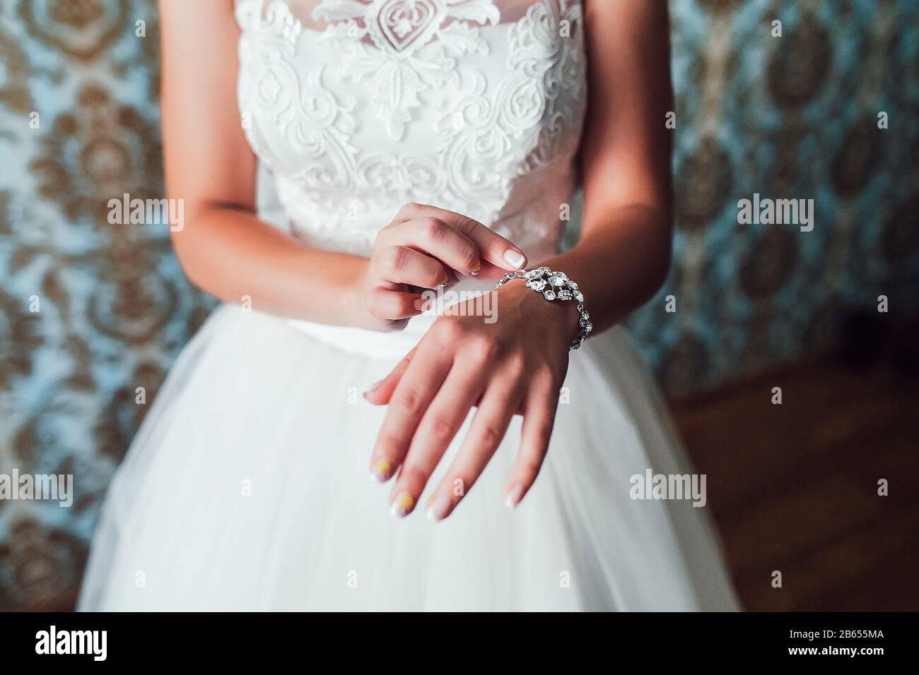 Women wearing bracelets hi-res stock photography and images - Alamy