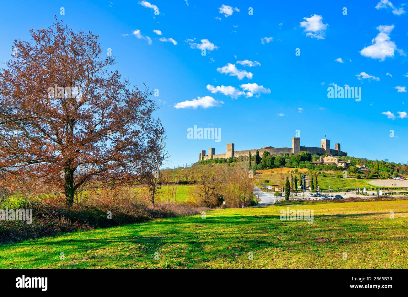 Monteriggioni medieval fortified village with city walls and towers, on ...
