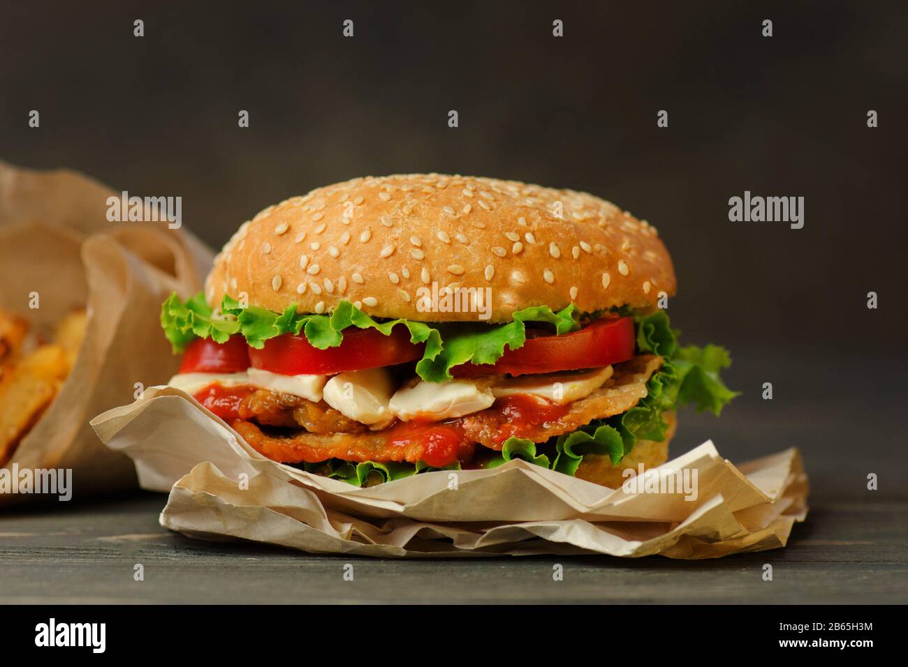 Close-up of home made burger. Burger with meat and cheese. Big ...