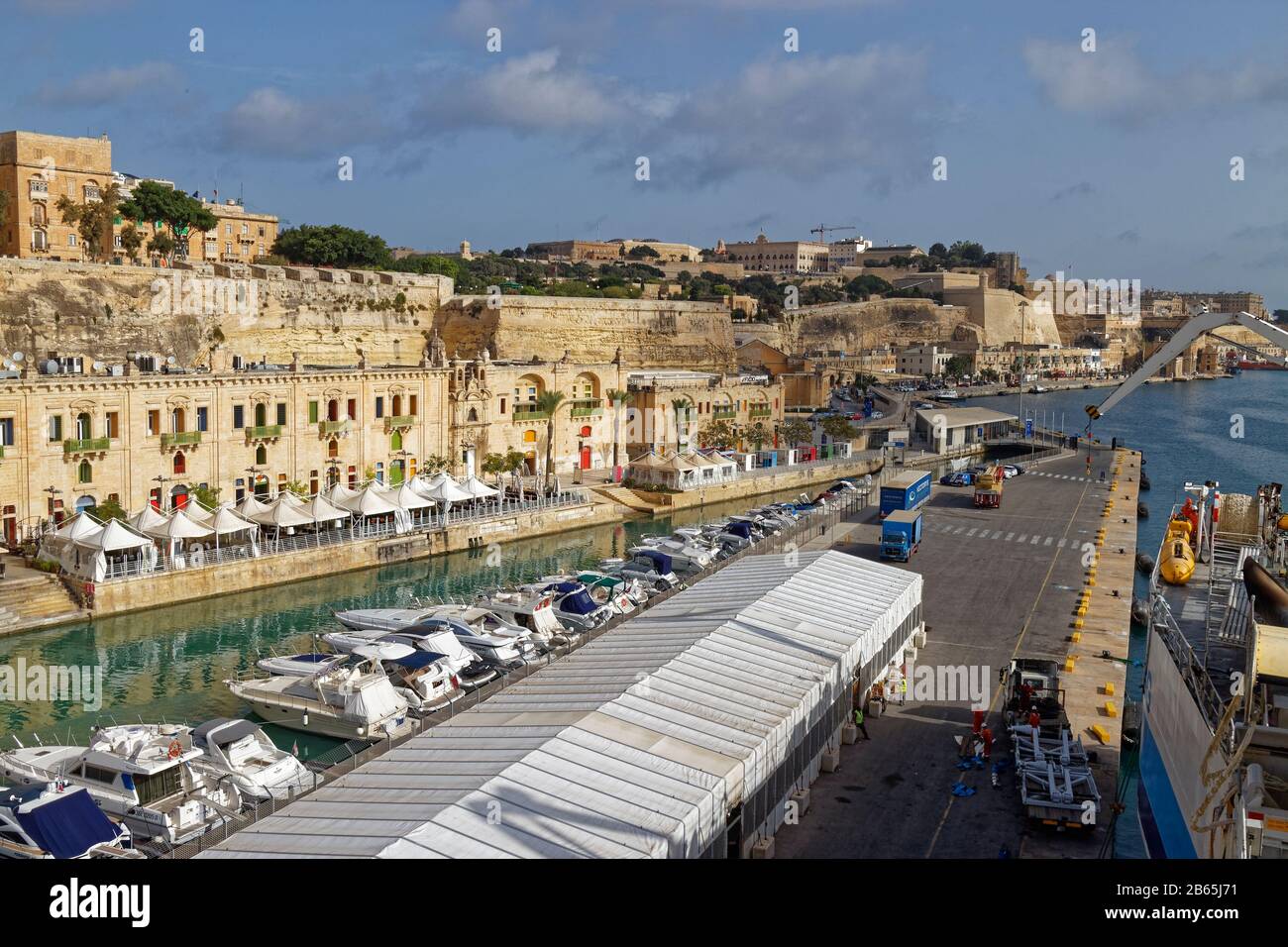 Valletta Waterfront beneath the Fortified City walls, with the City ...