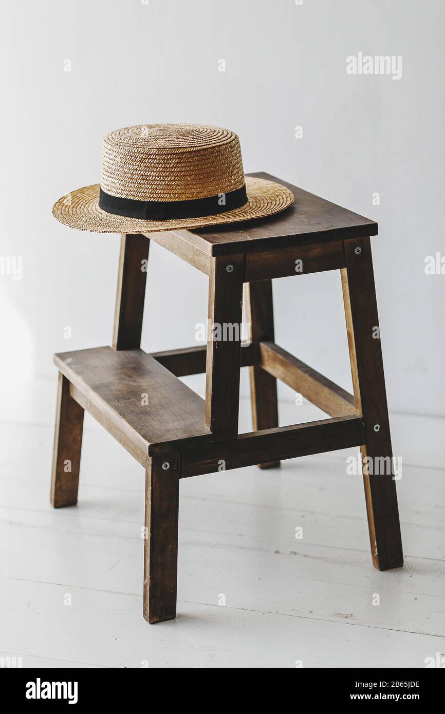 Summer panama straw hat on stool in stidio Stock Photo - Alamy
