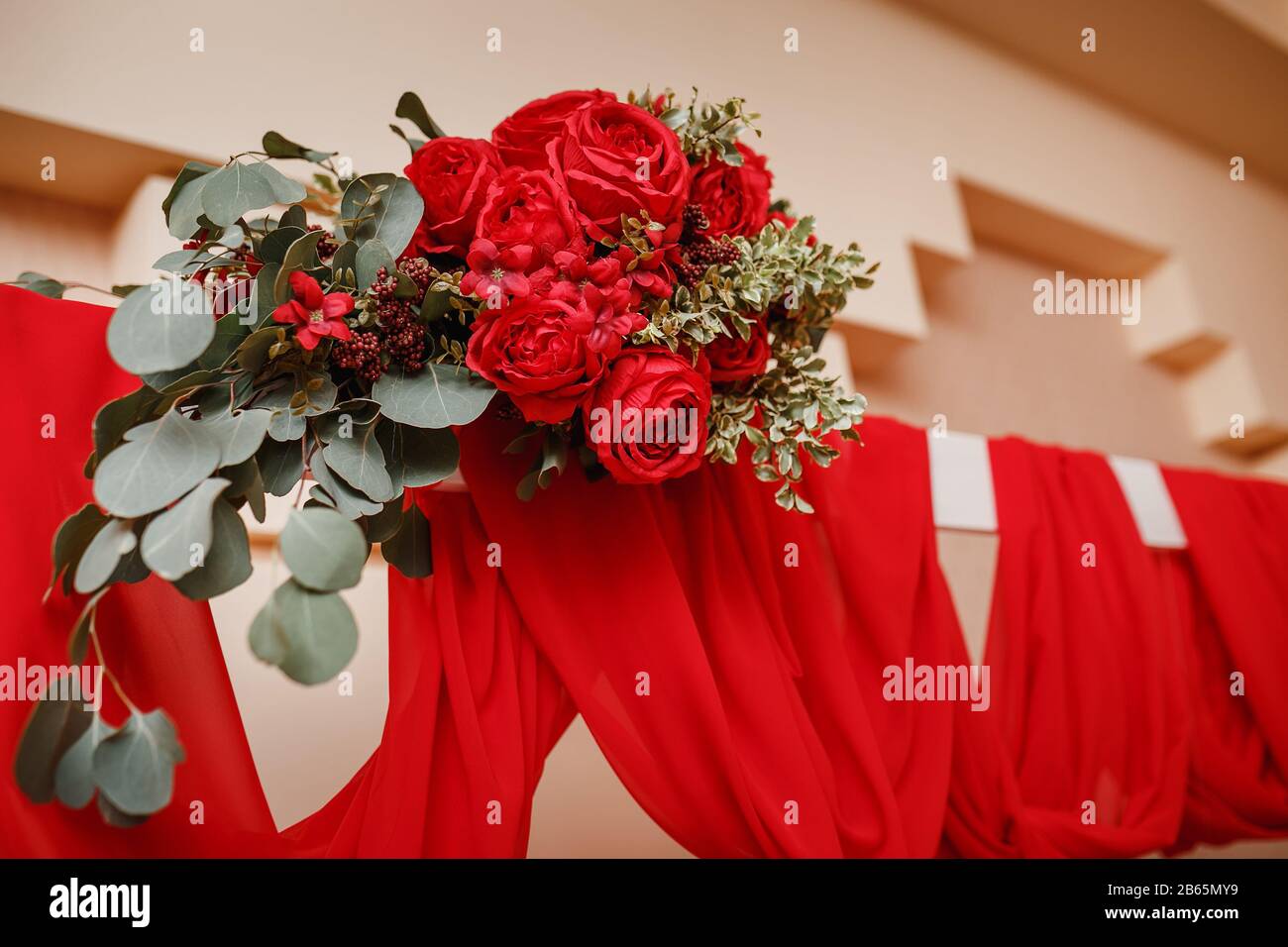 wedding banquet flower decoration in bright red color Stock Photo - Alamy