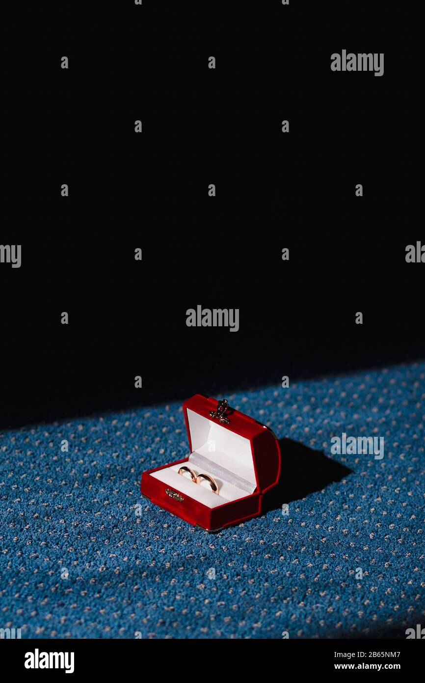 Two wedding rings in nice red box Stock Photo - Alamy