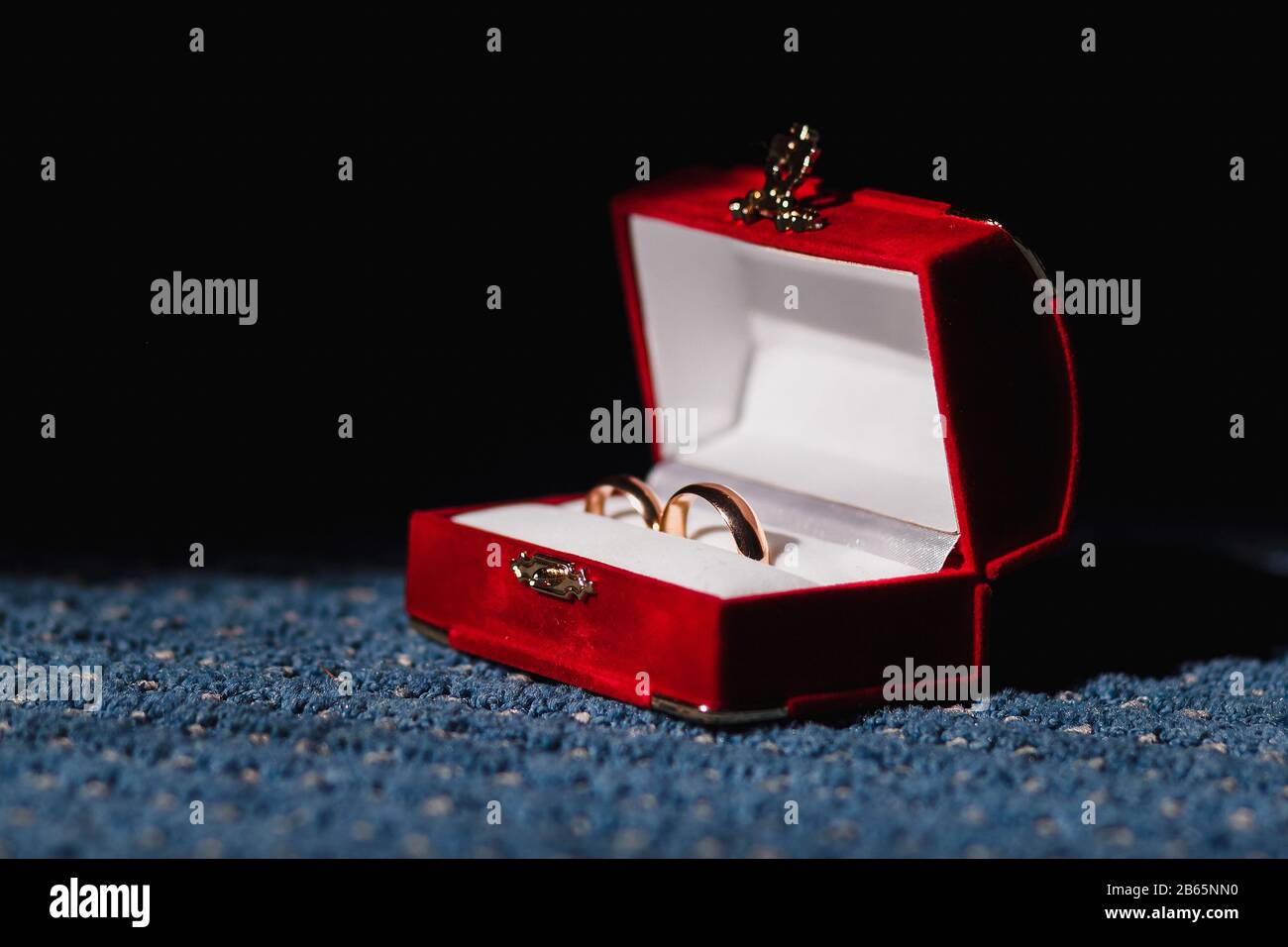 Two wedding rings in nice red box Stock Photo - Alamy