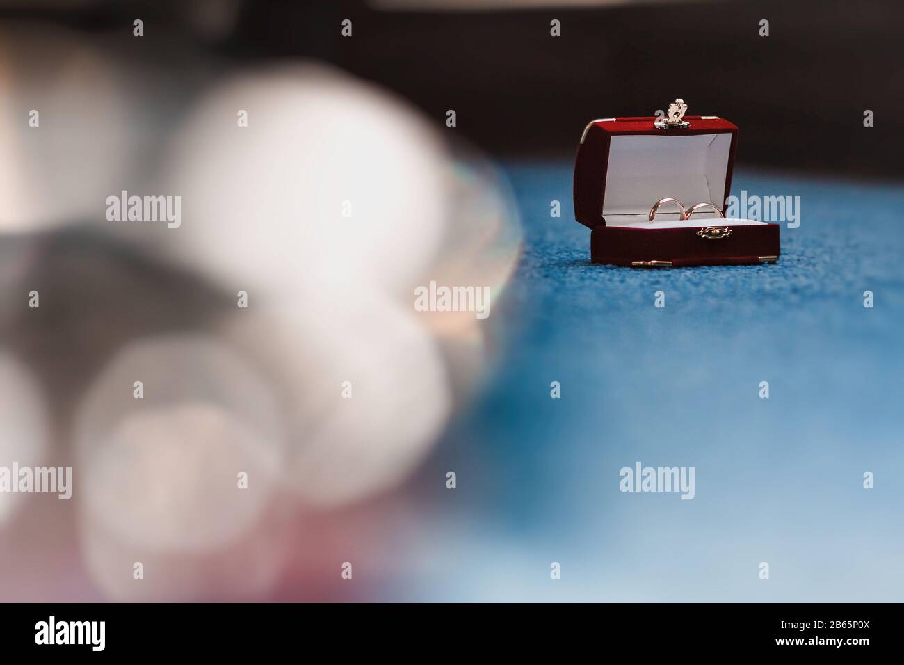 Two wedding rings in nice red box Stock Photo - Alamy