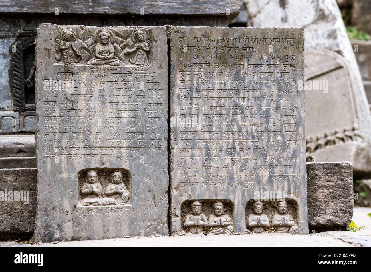 Bas-relief at the bottom of Eastern stairway leading to Swayambhunath ...