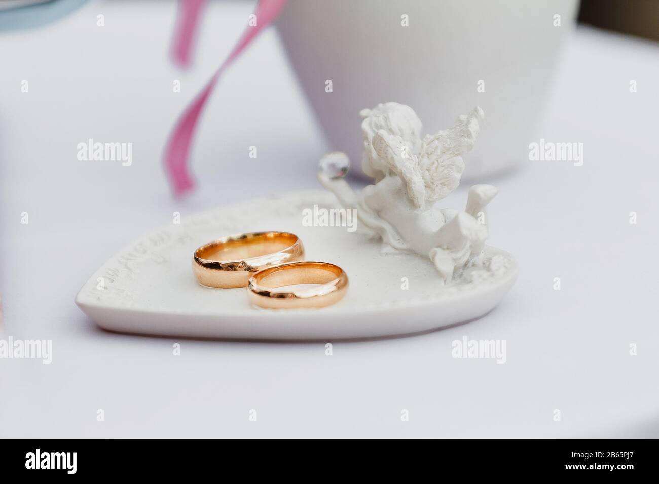 Wedding Register table with Pen, Bride and Groom Rings Stock Photo - Alamy