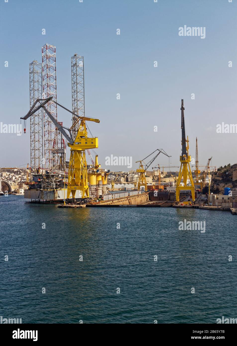 An Empty Dry Dock with its associated Port Facilities and Cranes, with ...