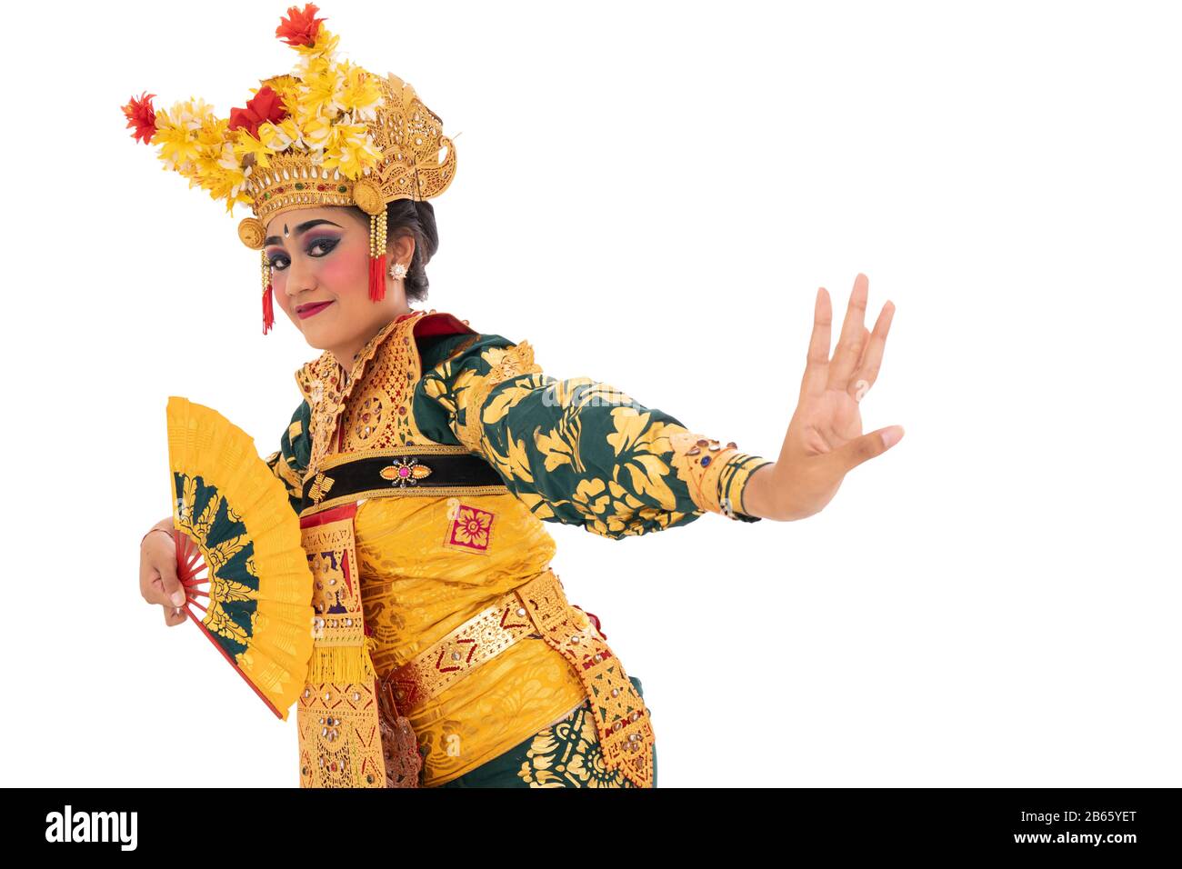 Balinese dancers hold a fan, traditional Indonesia dance culture ...