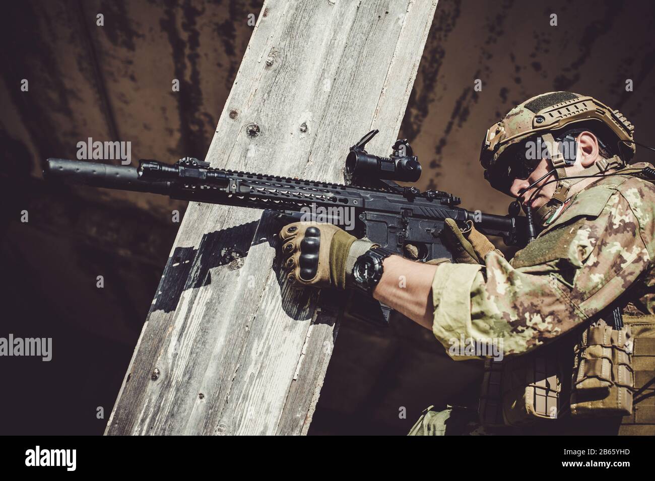 man in military camouflage vegetato uniform with automatic assault ...