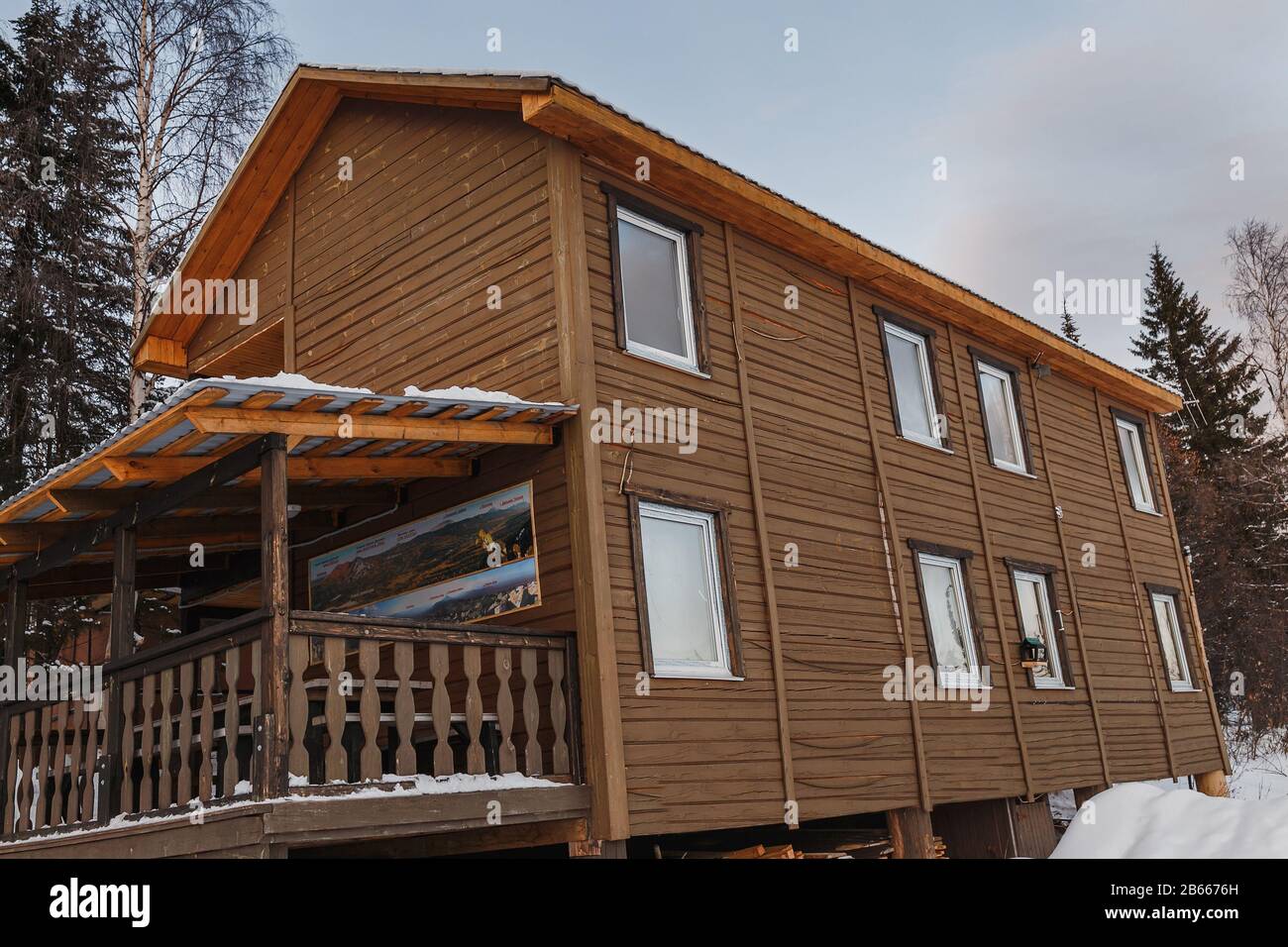 two-storey building shelter touristic campsite in the winter forest ...