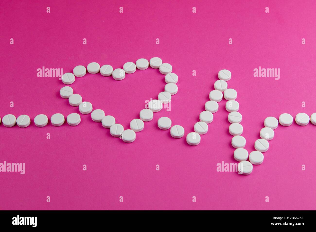 Medicine, healthcare and pharmacy concept - pills and of drugs in shape ...