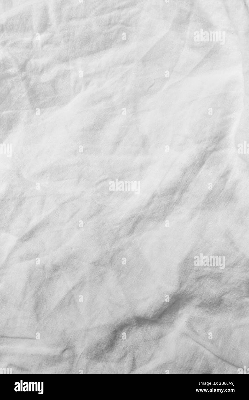 Wrinkled natural textile textured background Stock Photo - Alamy