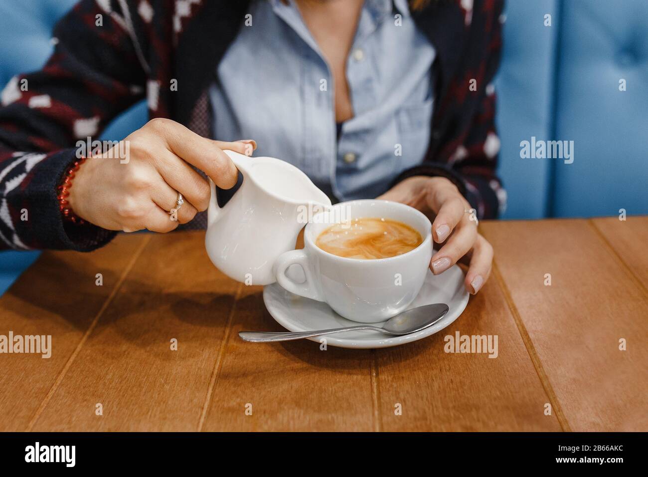 Vintage tea kettle hand hi-res stock photography and images - Alamy