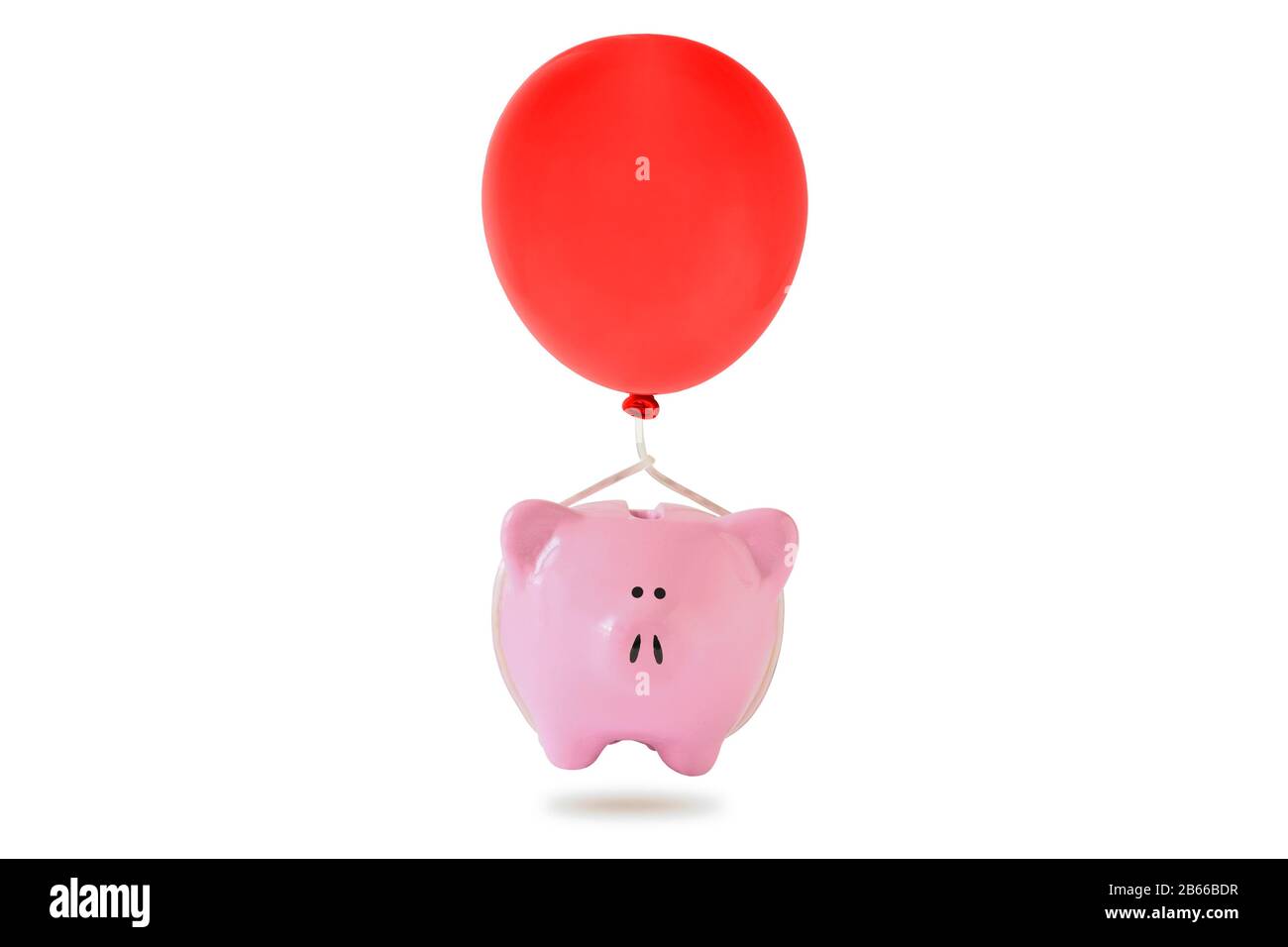 Piggy bank with red balloon floating on white background - Concept of ...