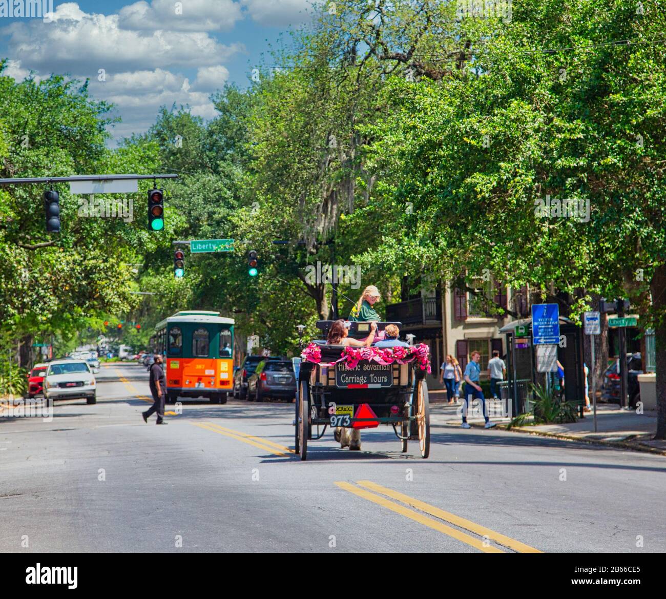 Carriage Ride and Tour Bus in Savannah Stock Photo - Alamy