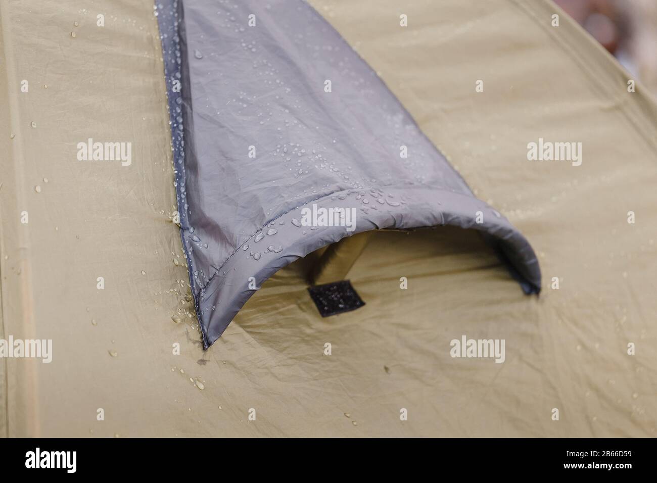 Close up of camping tent ventilation window detail with rain drops ...