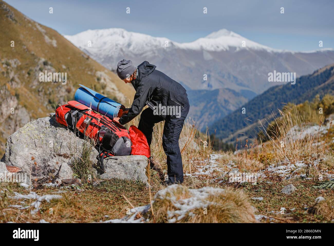 Woman too heavy backpack hi-res stock photography and images - Alamy