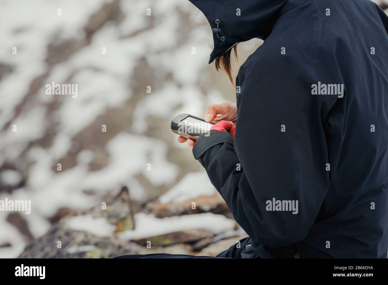 hand holding a GPS devices with outdoor background Stock Photo - Alamy
