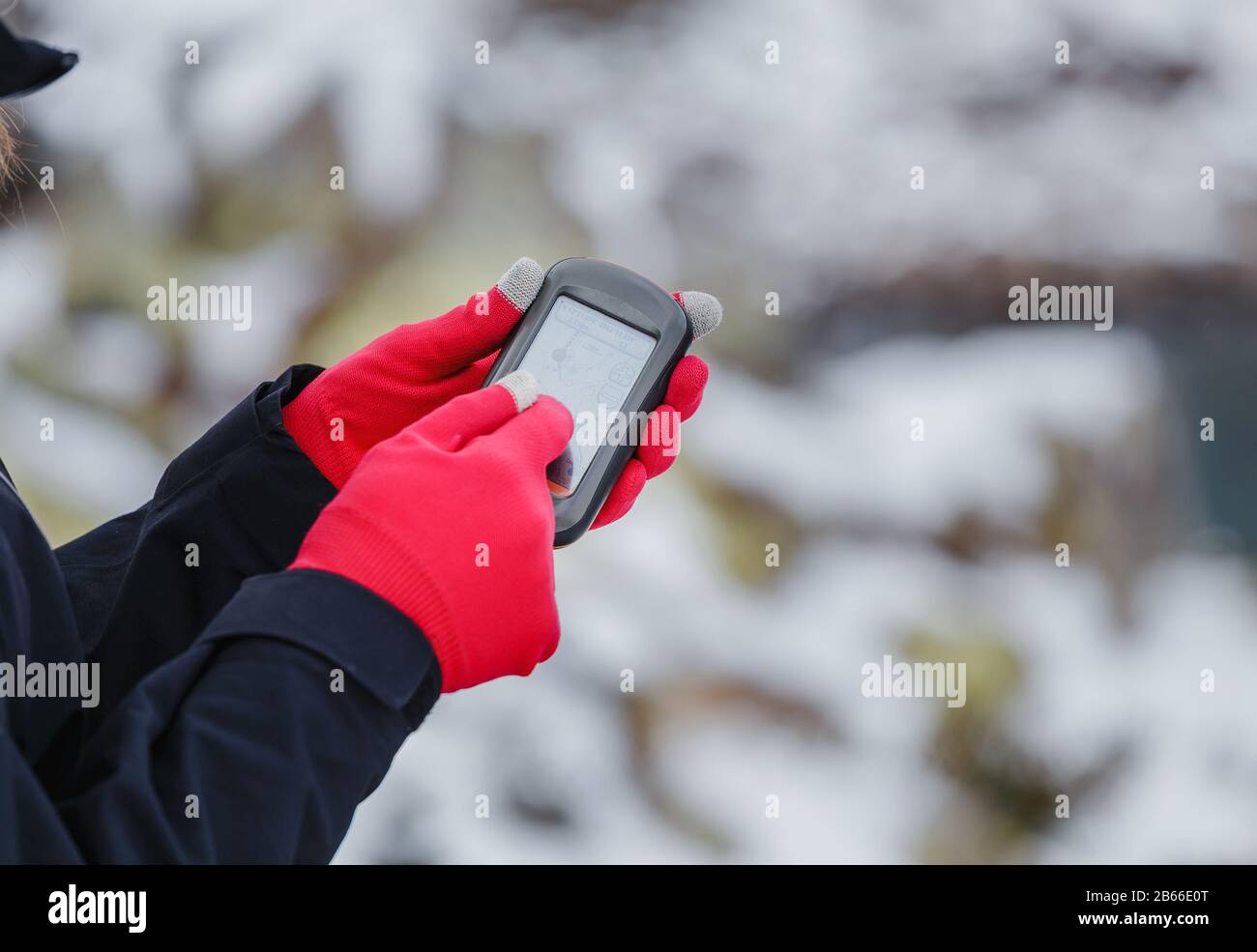 hand holding a GPS devices with outdoor background Stock Photo - Alamy