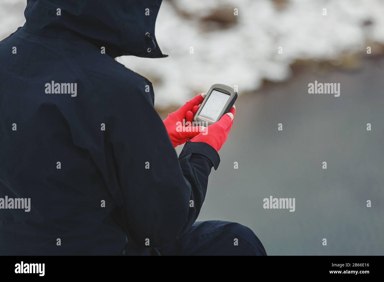 hand holding a GPS devices with outdoor background Stock Photo - Alamy