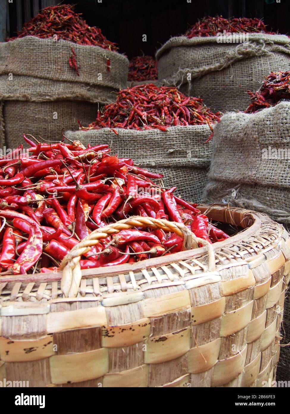 Basket of dried chili pepper Stock Photo - Alamy