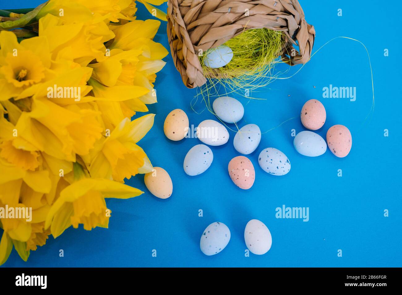 Happy Easter. Easter holiday decorations on trendy colored classic blue ...