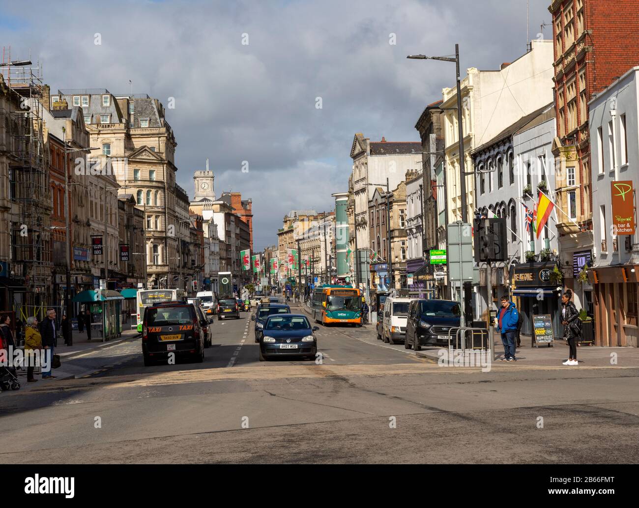 Traffic and people in busy St Mary Street, city centre of Cardiff ...