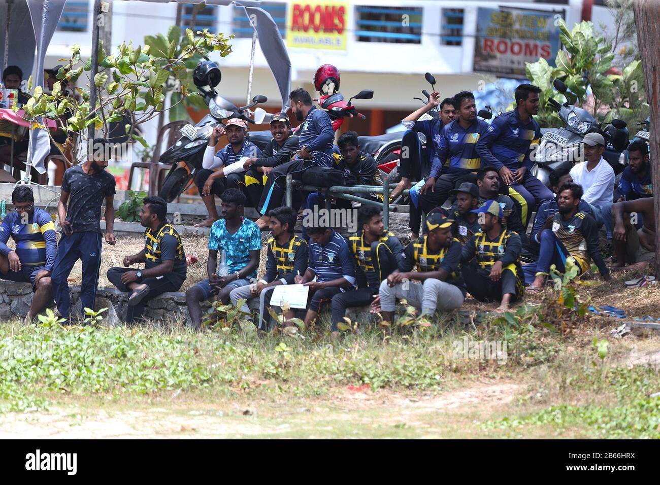 Sri Lankan Cricket Fans Play A Game Of Cricket On The Beach At Galle