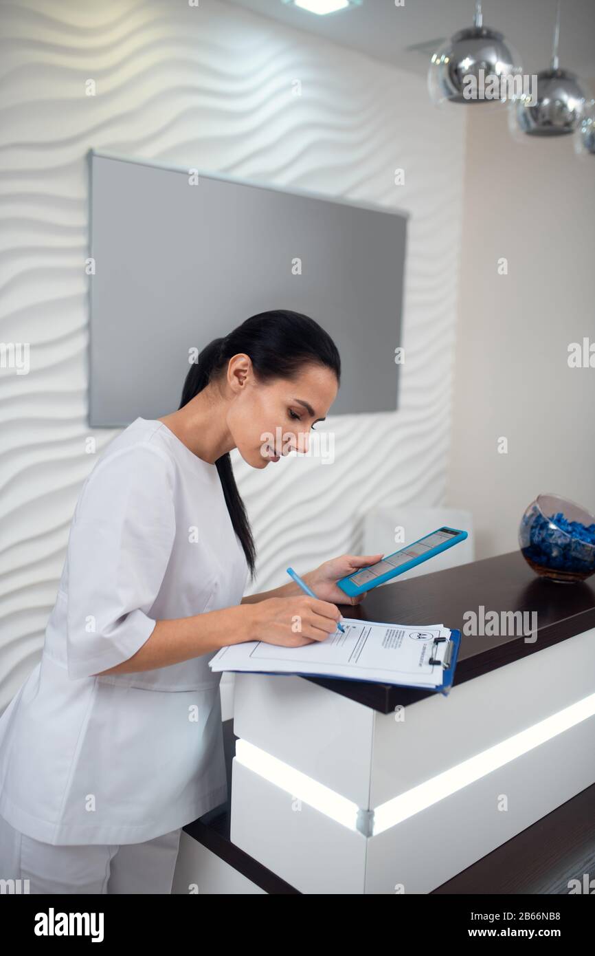 Beauty salon receptionist making hi-res stock photography and images ...