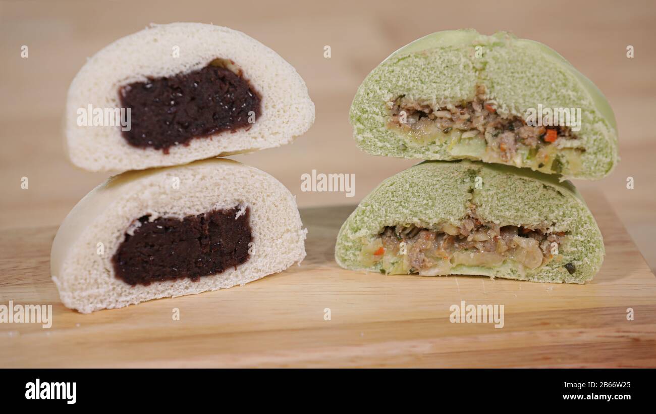 Korean Traditional Steamed Buns with red bean and vegetable fillings ...