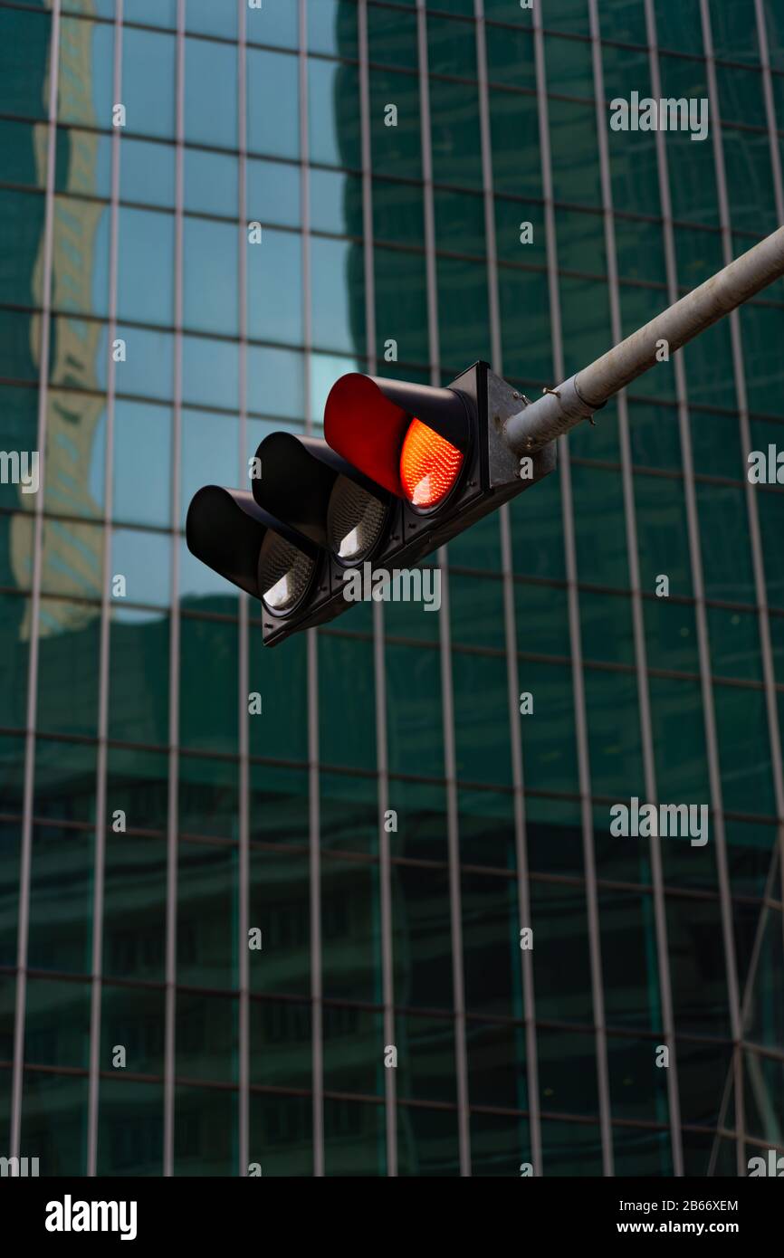 Red traffic light downtown the city Stock Photo - Alamy