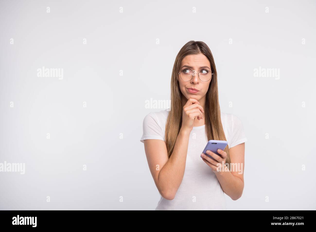 Photo of thinking pensive contemplating girl lost in thoughts while ...