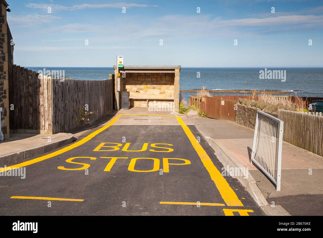 A bus stop at a dead end road in the seaside town of Craster ...