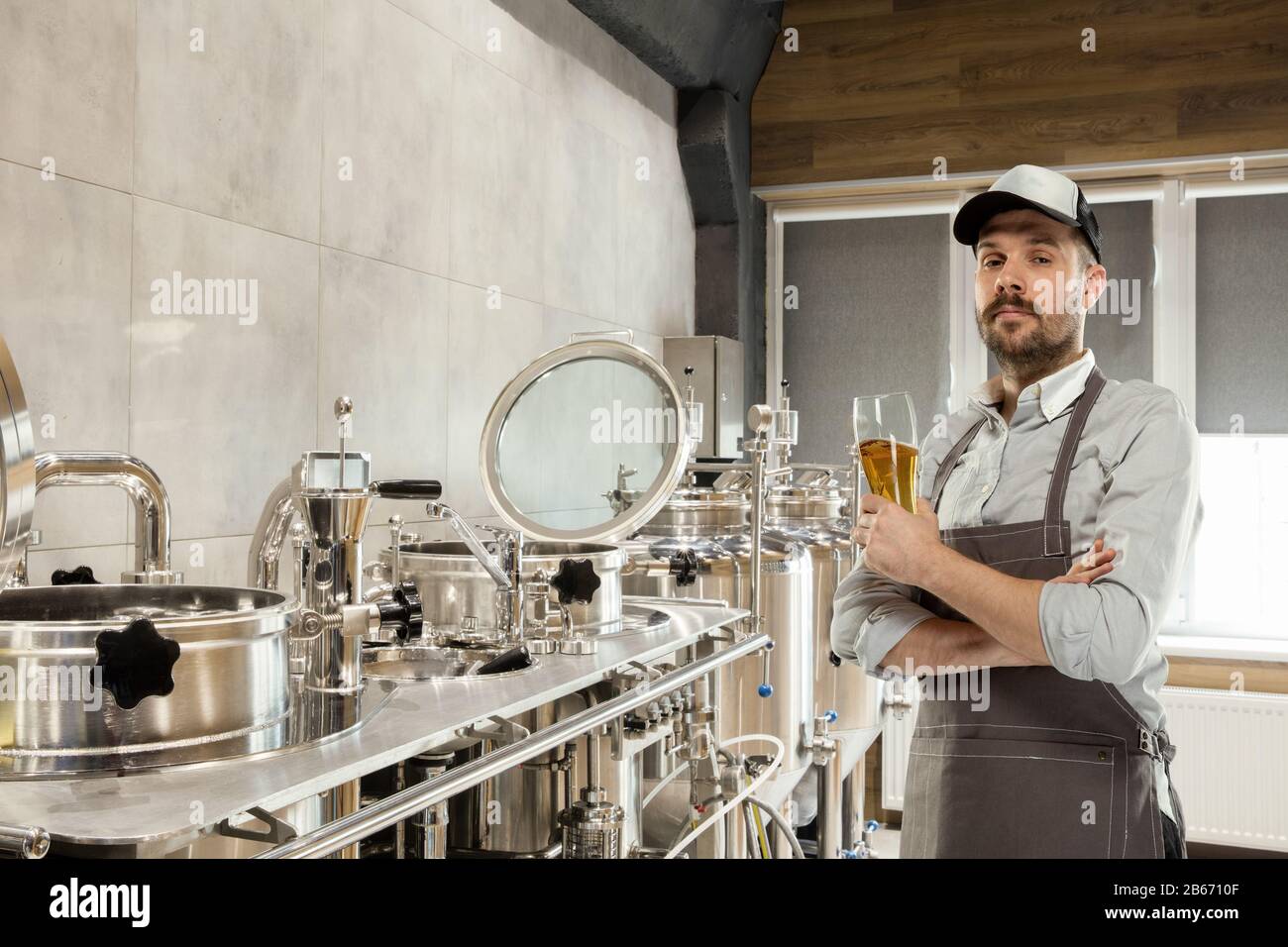 Professional brewer on his own craft alcohol production. Specialist ...