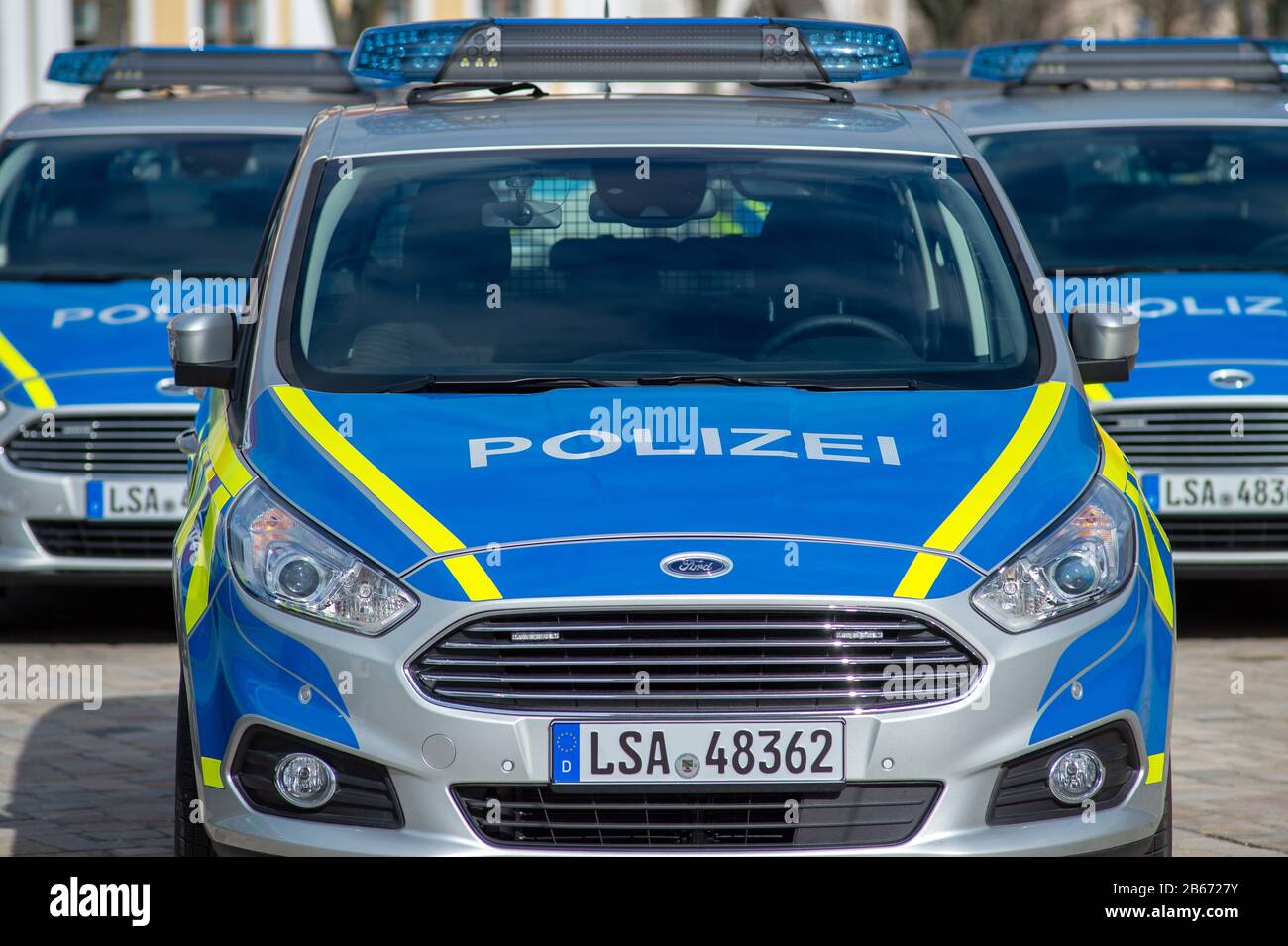 09 March 2020, Saxony-Anhalt, Magdeburg: Police vehicles stand side by ...