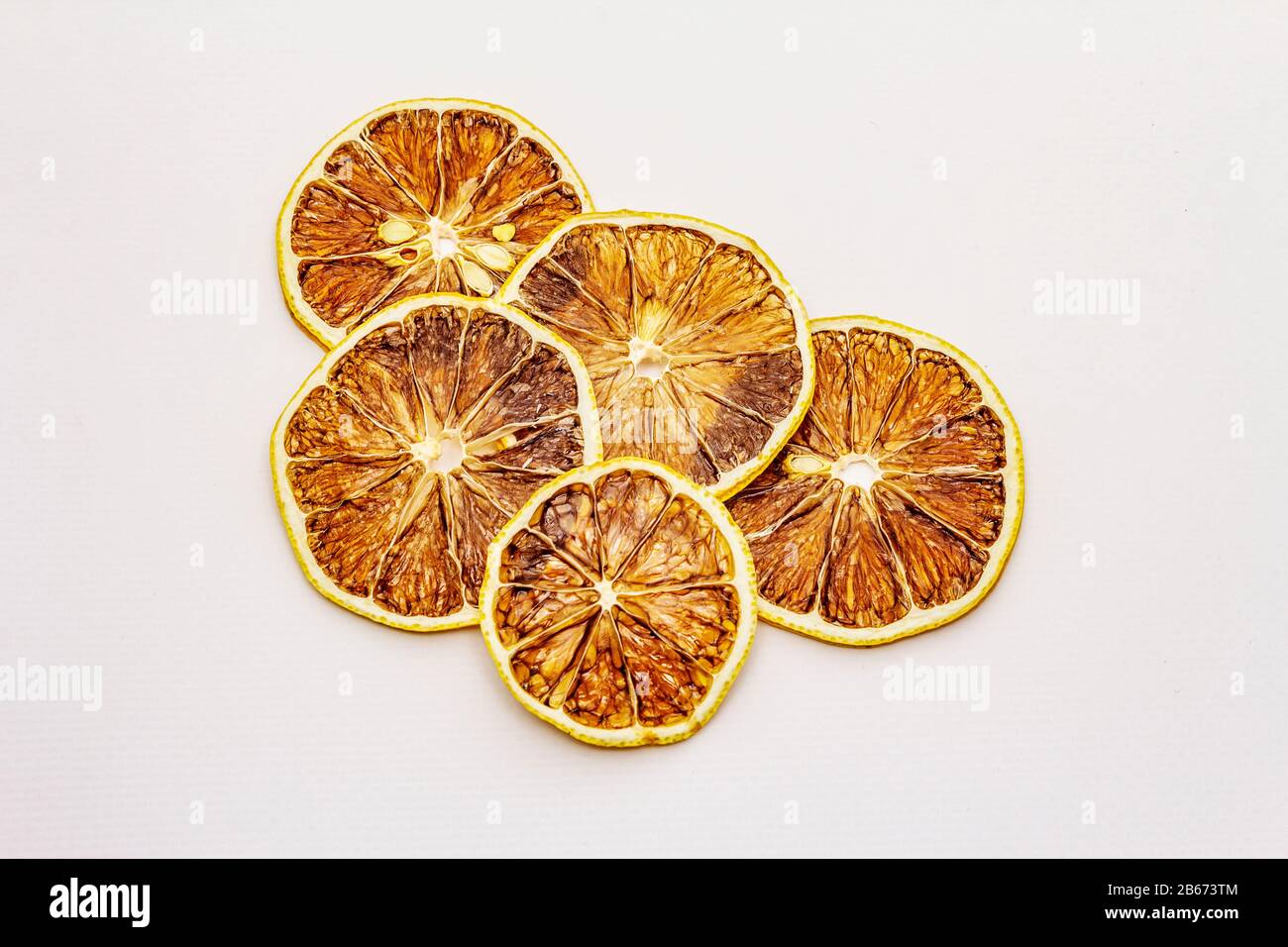 Dried slices of lemon isolated on white background. Healthy eating ...