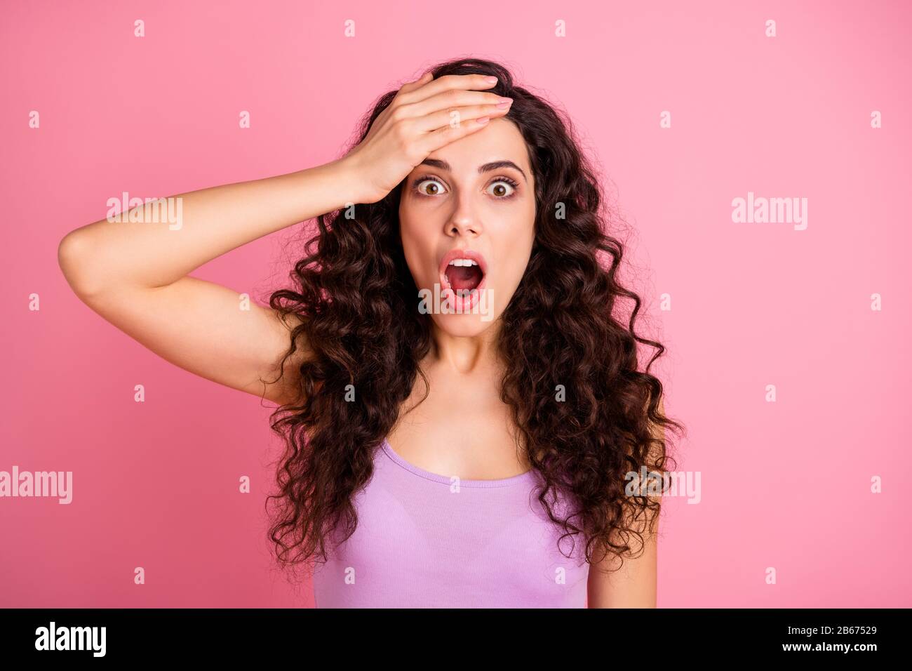 Photo of shocked attractive cute pretty girl wearing pink singlet ...