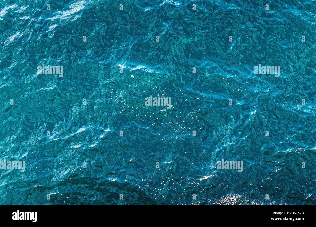 Turquoise ocean water waves background Stock Photo - Alamy