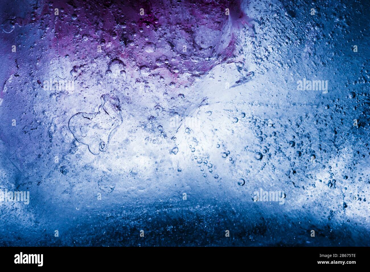 Backlit close-up of a block of ice Stock Photo - Alamy