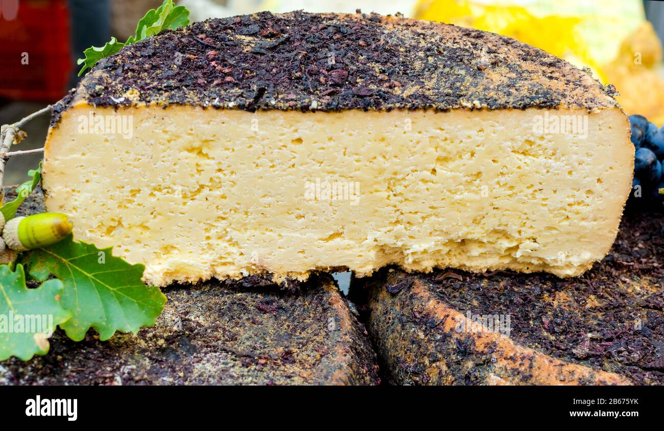 pecorino sheep cheese on wooden block, white background Stock Photo - Alamy