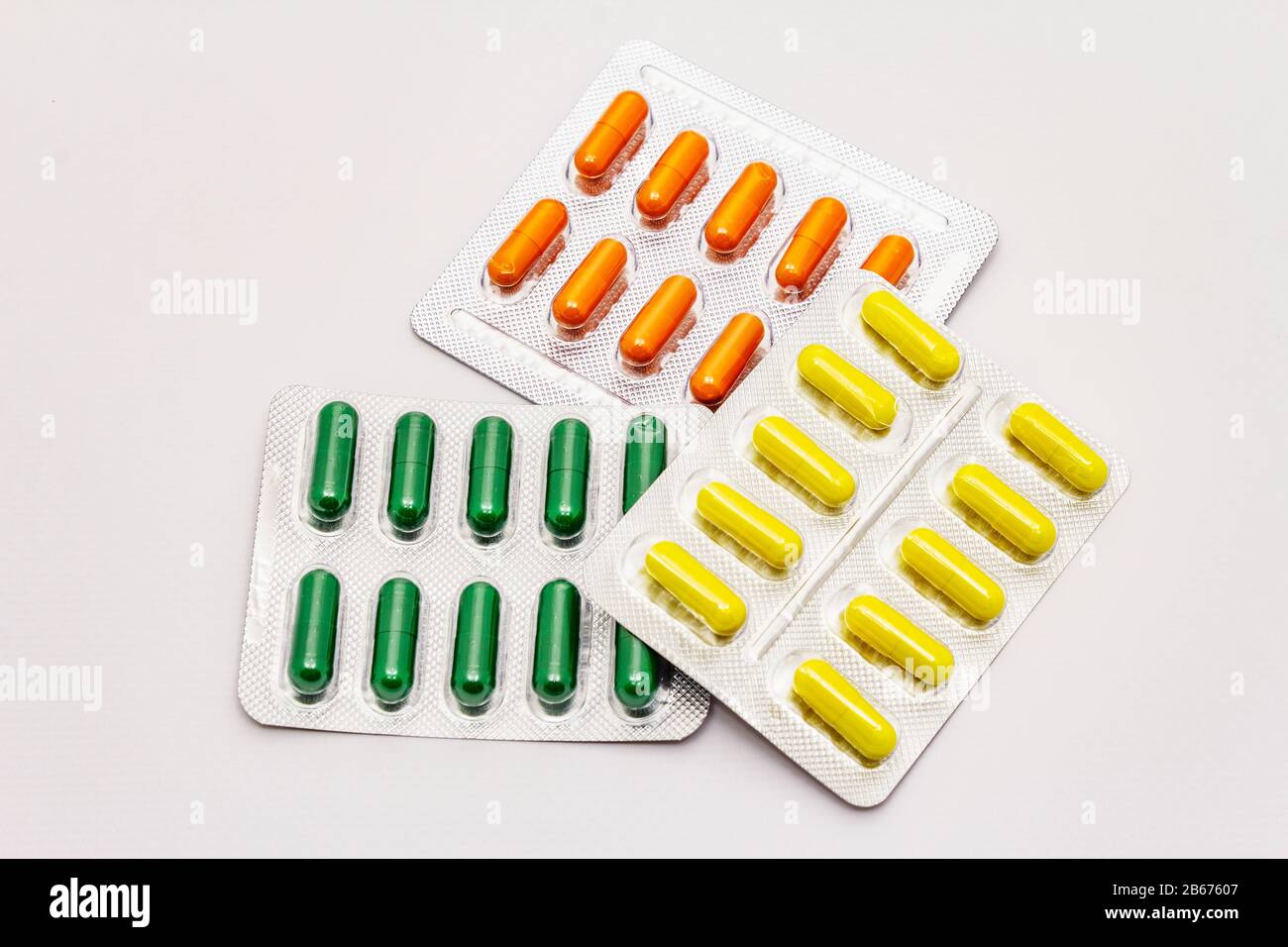 Assortment pharmaceutical tablets, capsules in blister pack isolated on ...